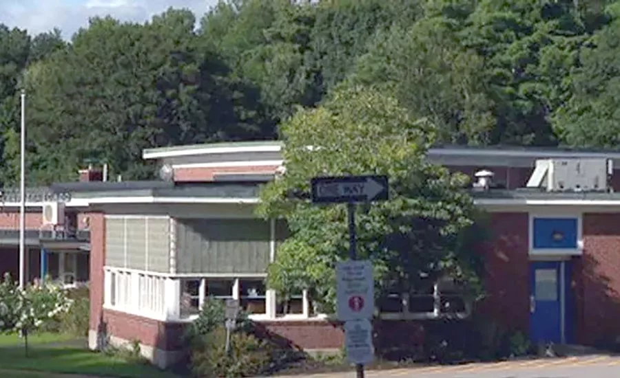 Squatters Found Living on Roof at Maine Elementary School | Roofing ...